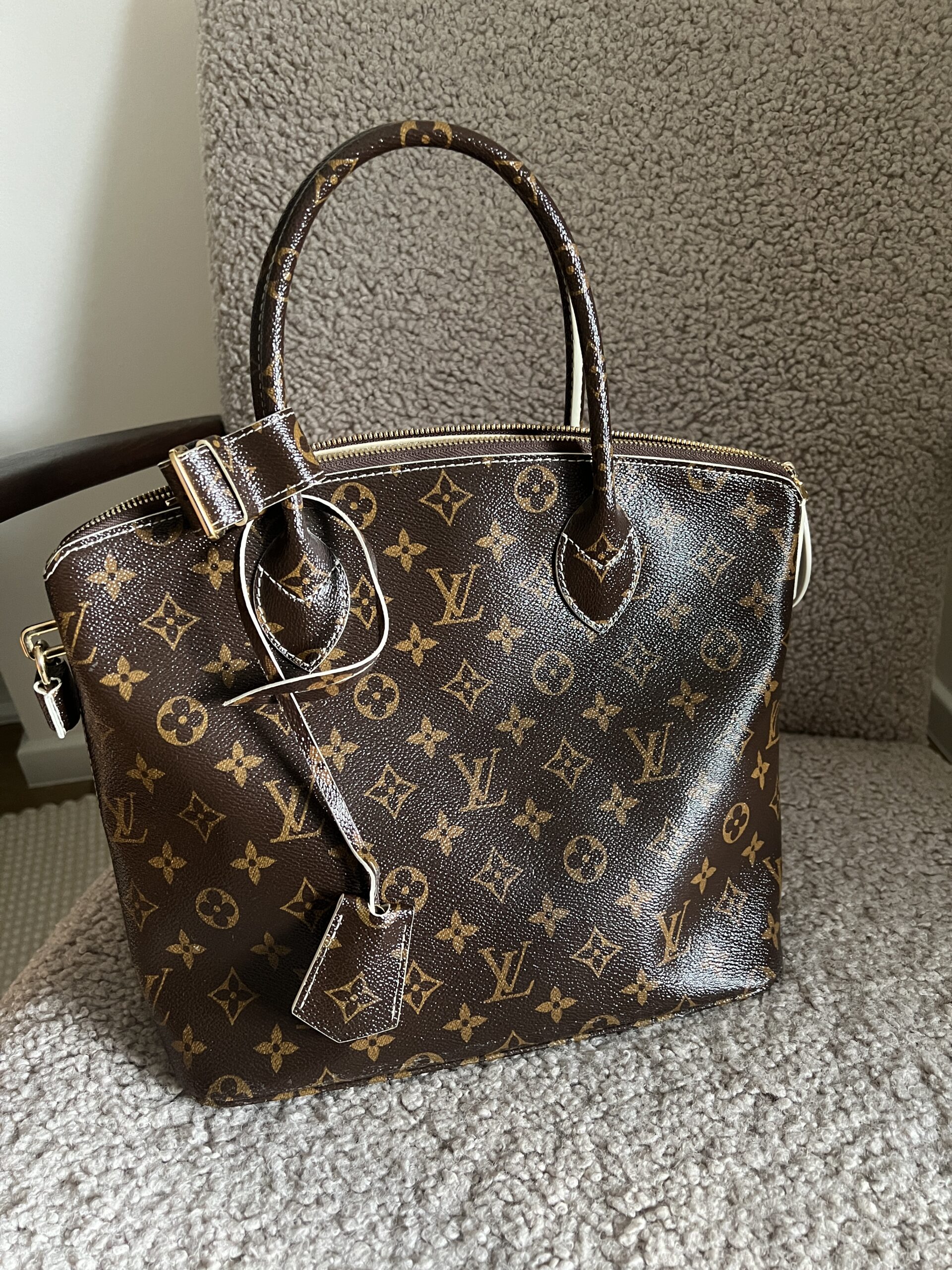 LOUIS VUITTON Lock It Monogram 2012 | UNLIMITAGE